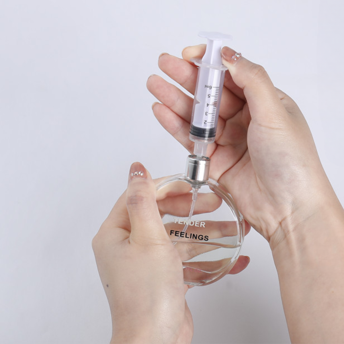 Adaptador de jeringa para decantar perfumes – Decants de Perfumes